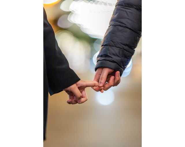 Holding Hands Letting Go